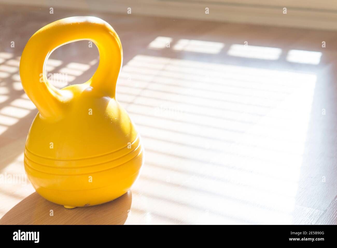 Woman exercise at home fitness weights hi-res stock photography and ...