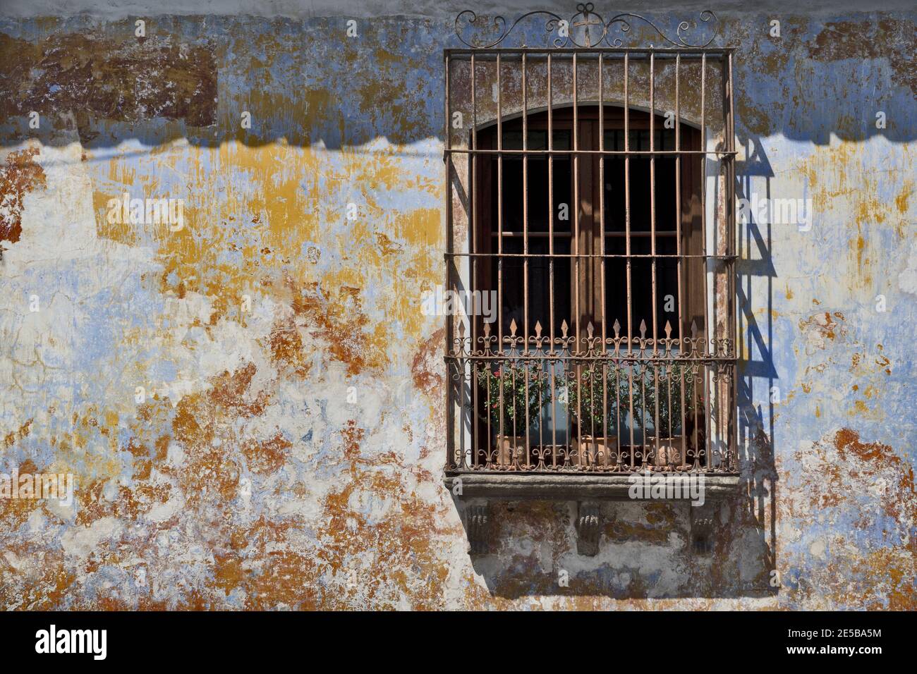 Antigua, Guatemala, Central America: antique peeled off wall with rusty ...