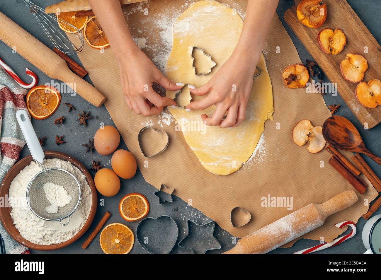 female hands making cookies from fresh dough at home Stock Photo - Alamy