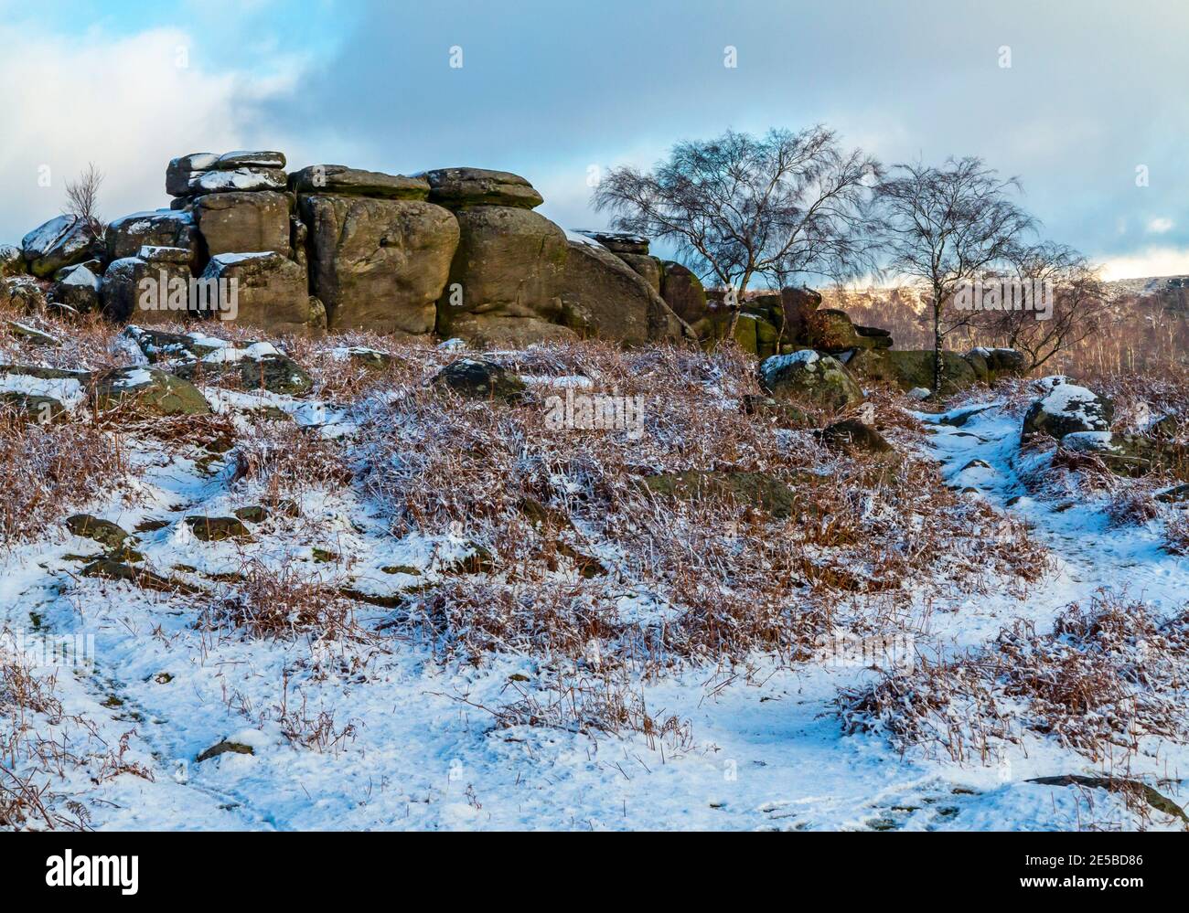 Winter view with trees and snow covered rocks at Gardom's Edge near ...
