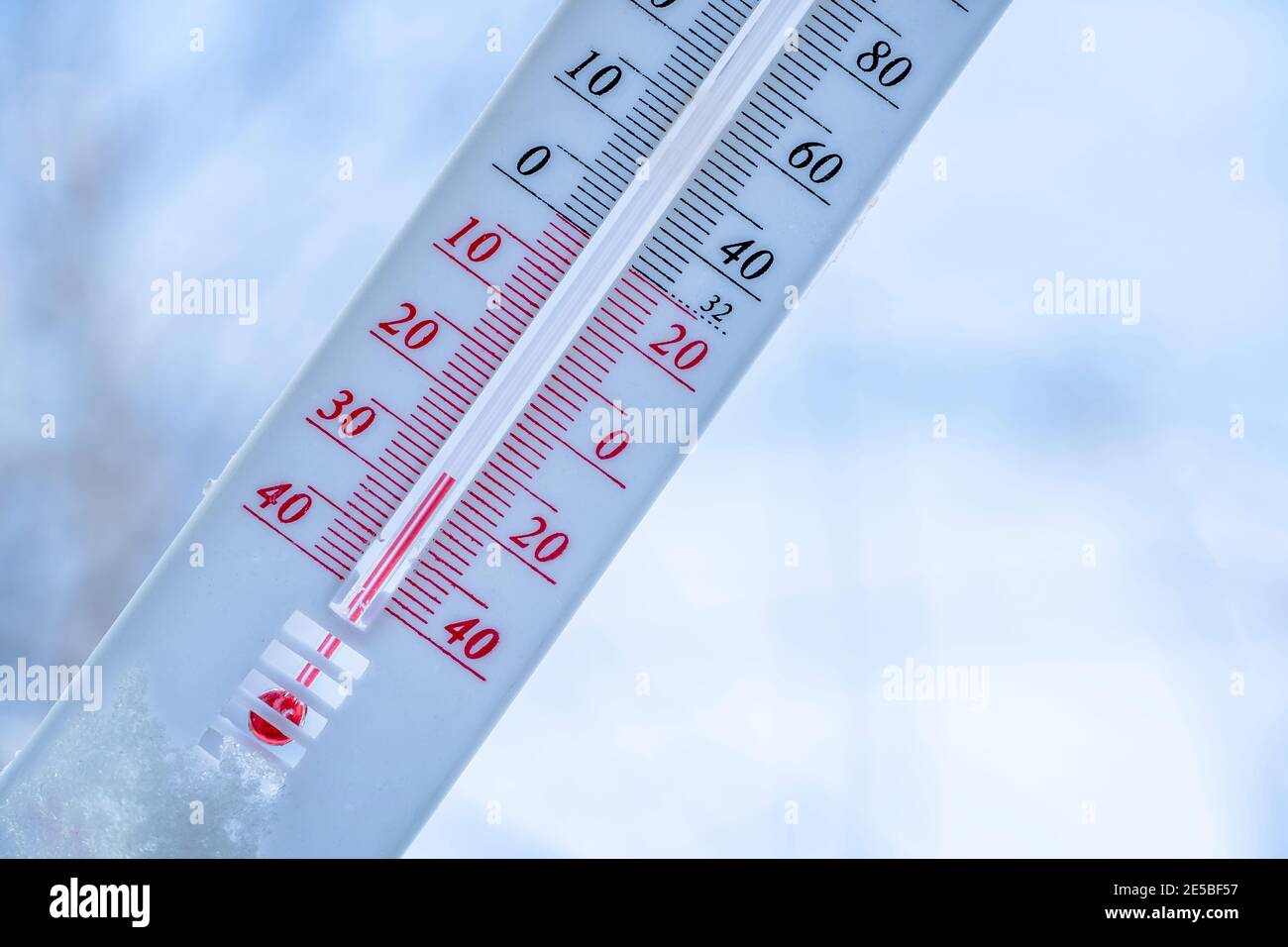 Outside thermometer showing low temperature hi-res stock photography ...