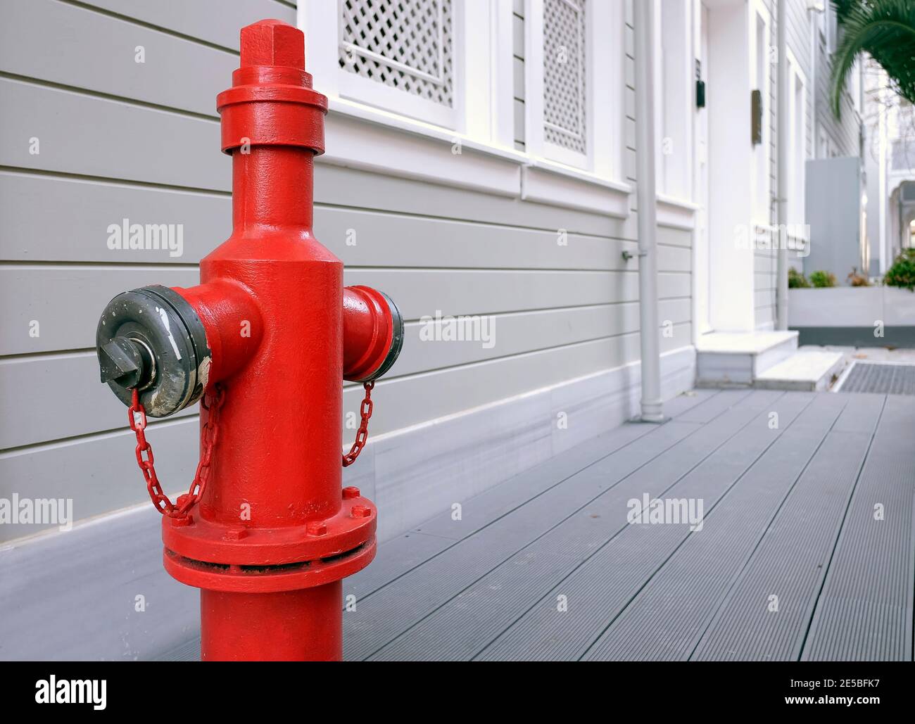 A nice looking bright red fire hydrant Stock Photo - Alamy