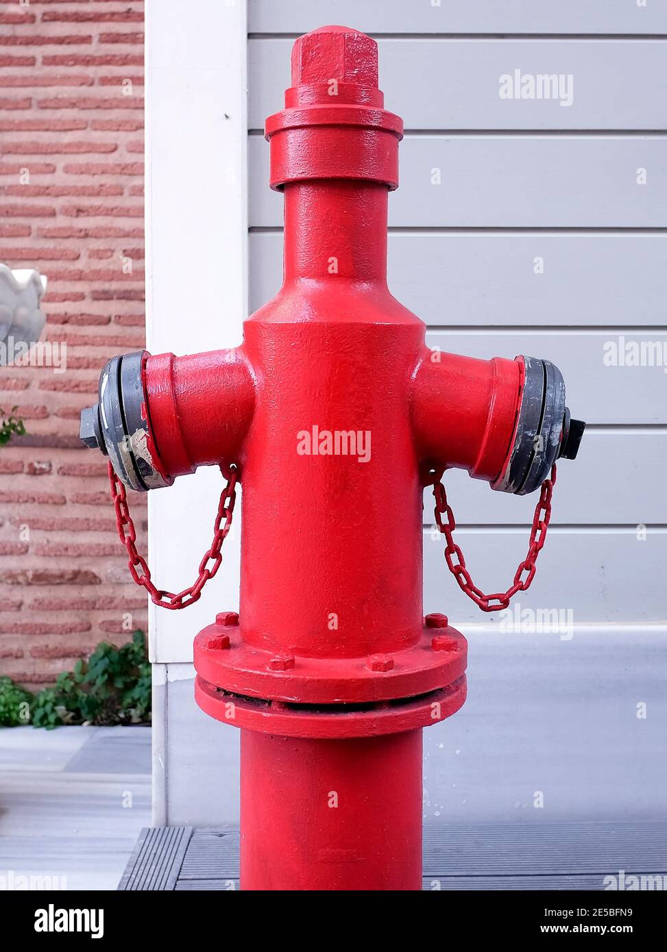 A nice looking bright red fire hydrant Stock Photo - Alamy