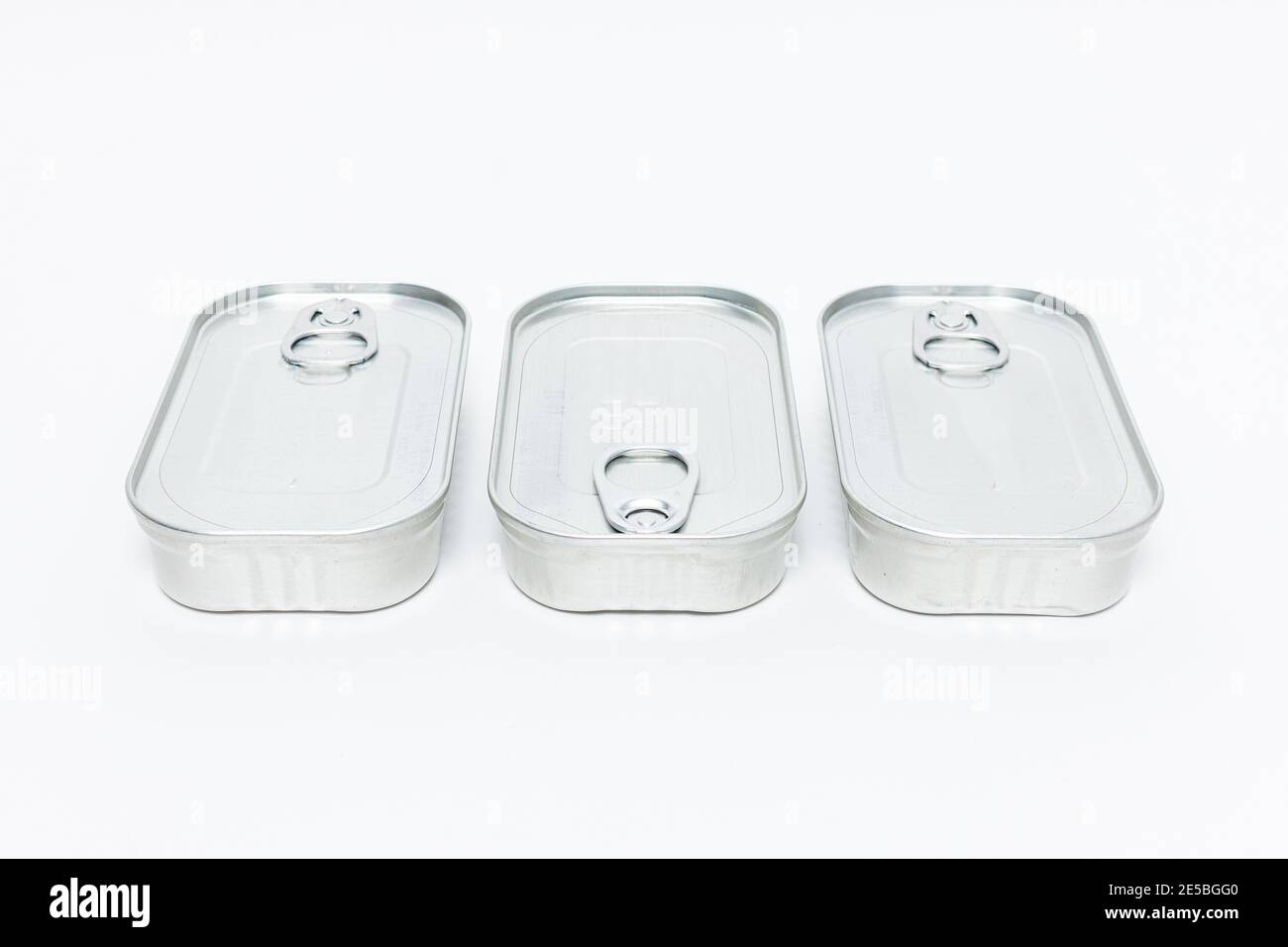 Closeup shot of aluminum cans for food preservation isolated on a white ...