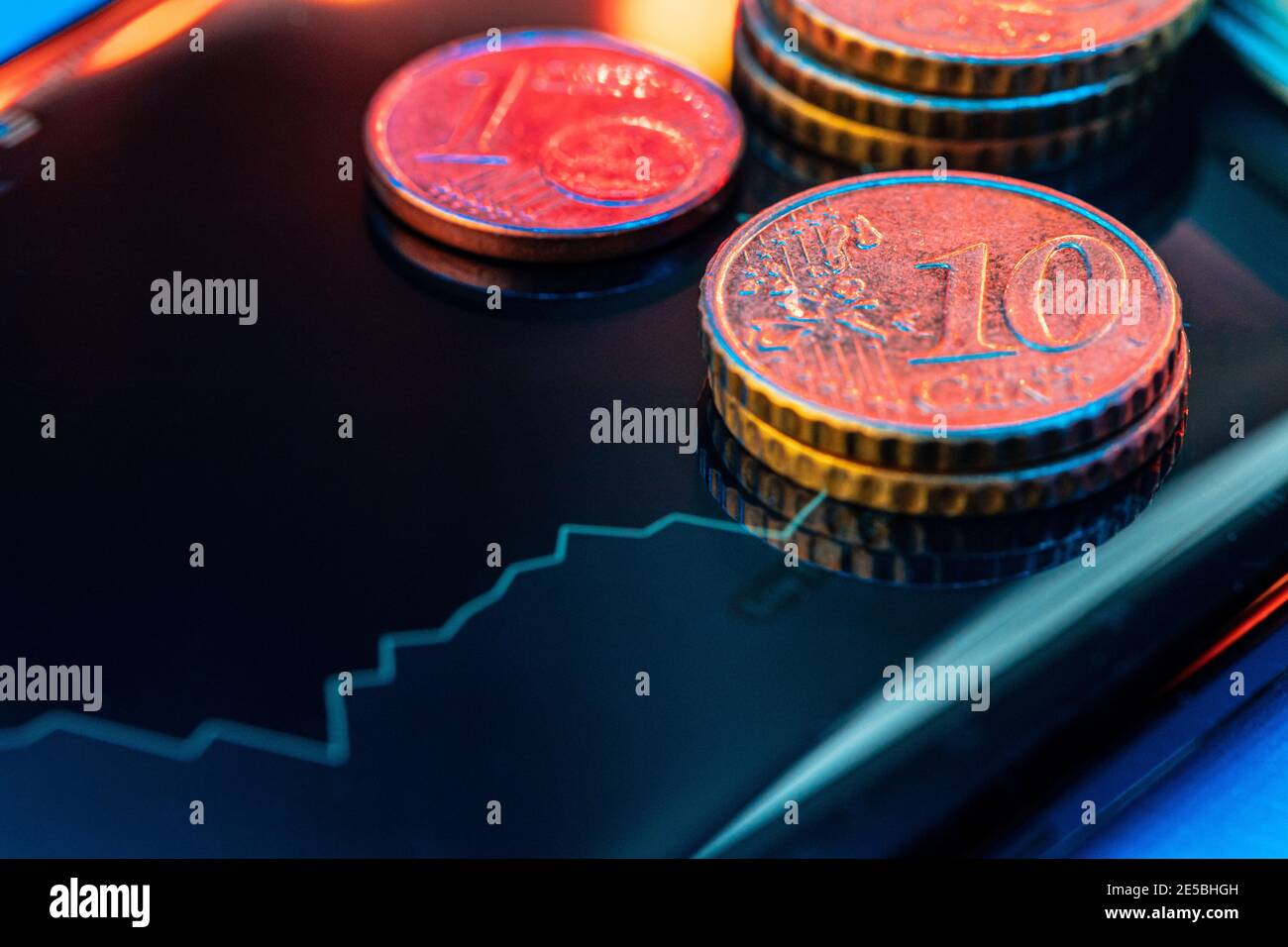 Euro coin on stock chart. Financial investment concept Stock Photo - Alamy