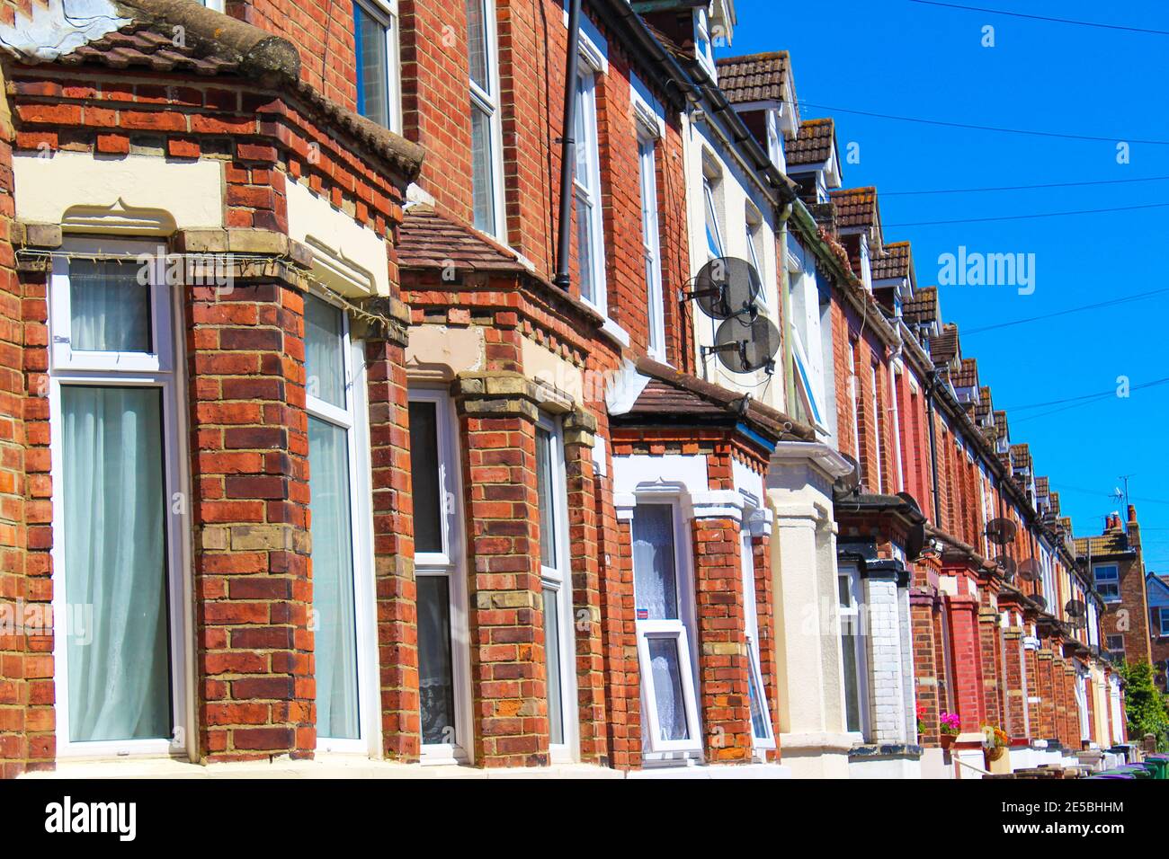 View of traditional terraced houses at a street of Folkestone town,Kent ...