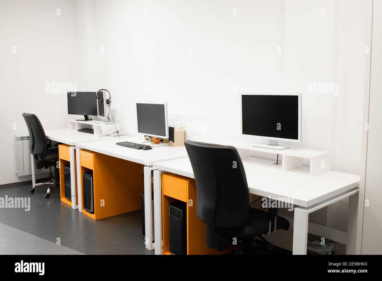 Workspace of a small professional company team Stock Photo - Alamy