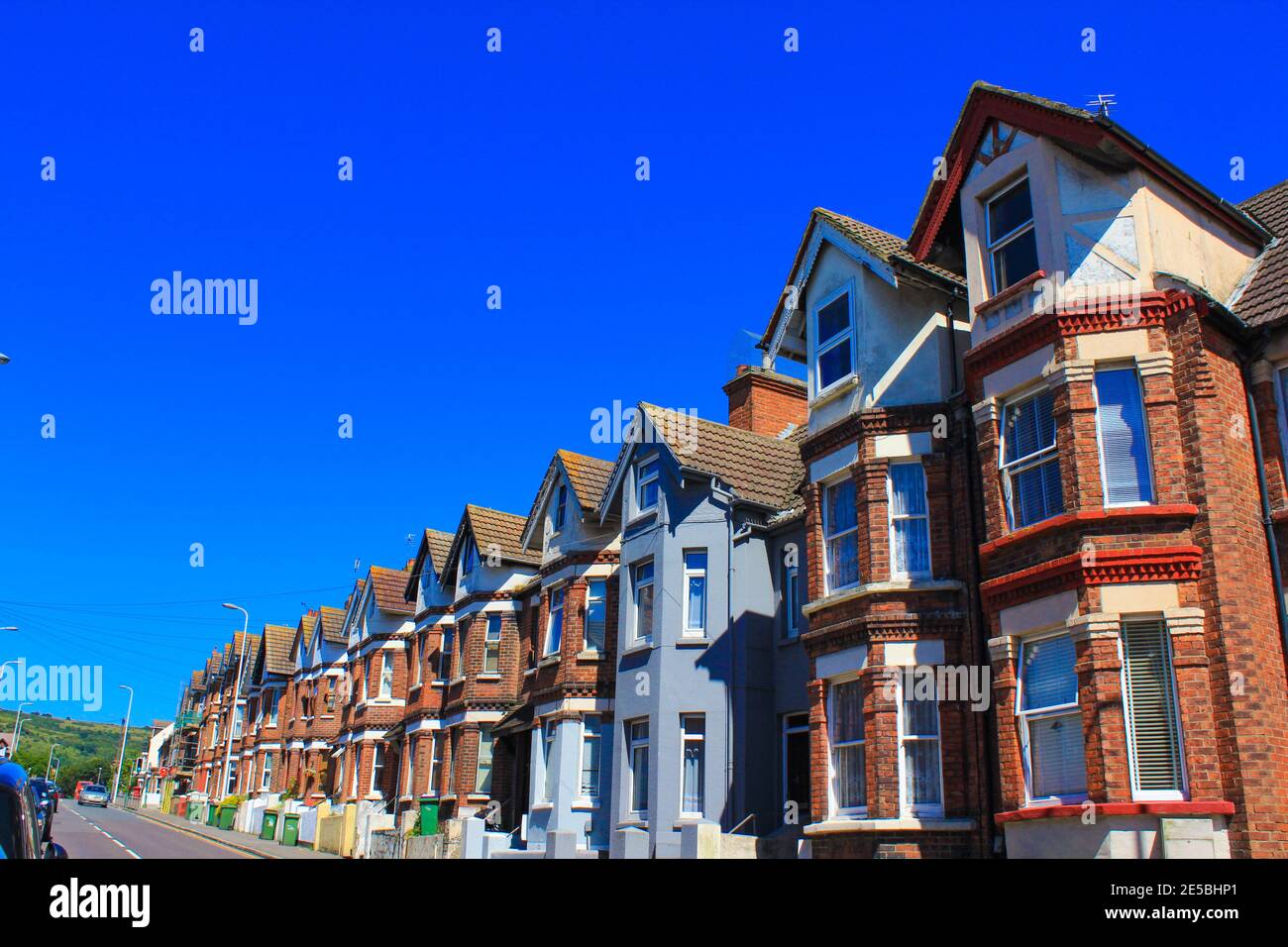 View of traditional terraced houses at a street of Folkestone town,Kent ...