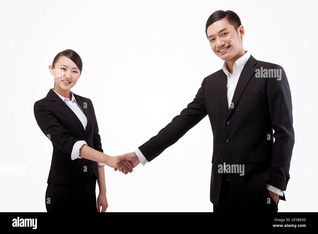Professional adults shaking hands hi-res stock photography and images ...