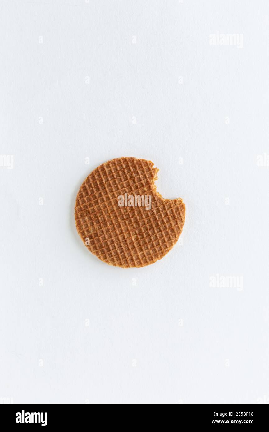 A delicious single Dutch stroopwafel (syrup or caramel waffle) with a ...