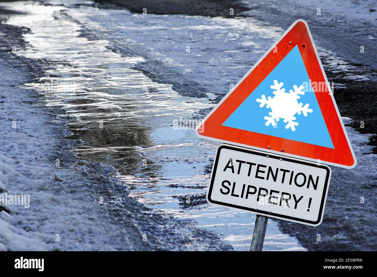 Attention slippery ice road hi-res stock photography and images - Alamy