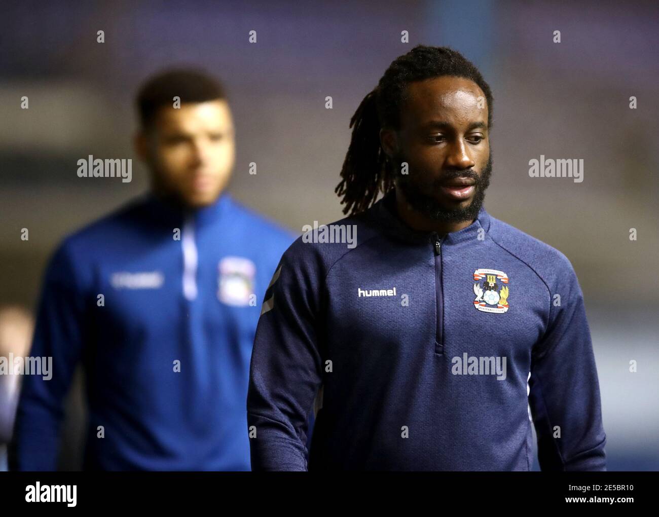 Coventry City's Fankaty Dabo (right) warms up on the pitch prior to the ...