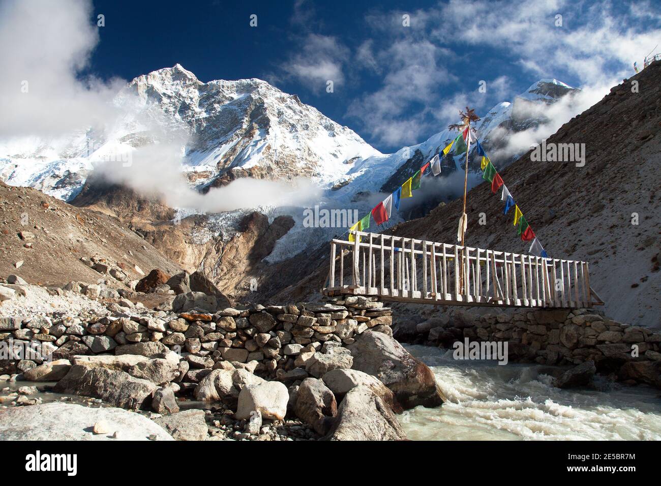 Mount Makalu with clouds, vooden bridge and river, Nepal Himalayas ...