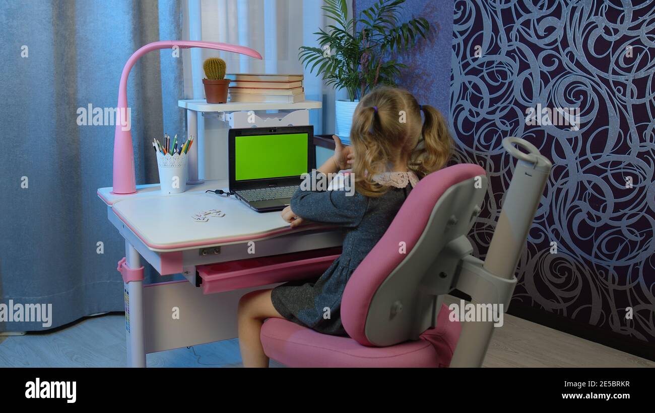 Preschool child girl distance online learning at home. Cute kid ...