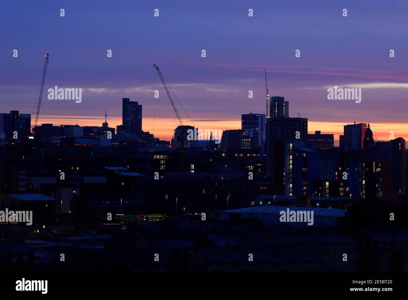 Leeds skyline at sunrise. Sky Plaza(left) Altus House (centre) Town ...