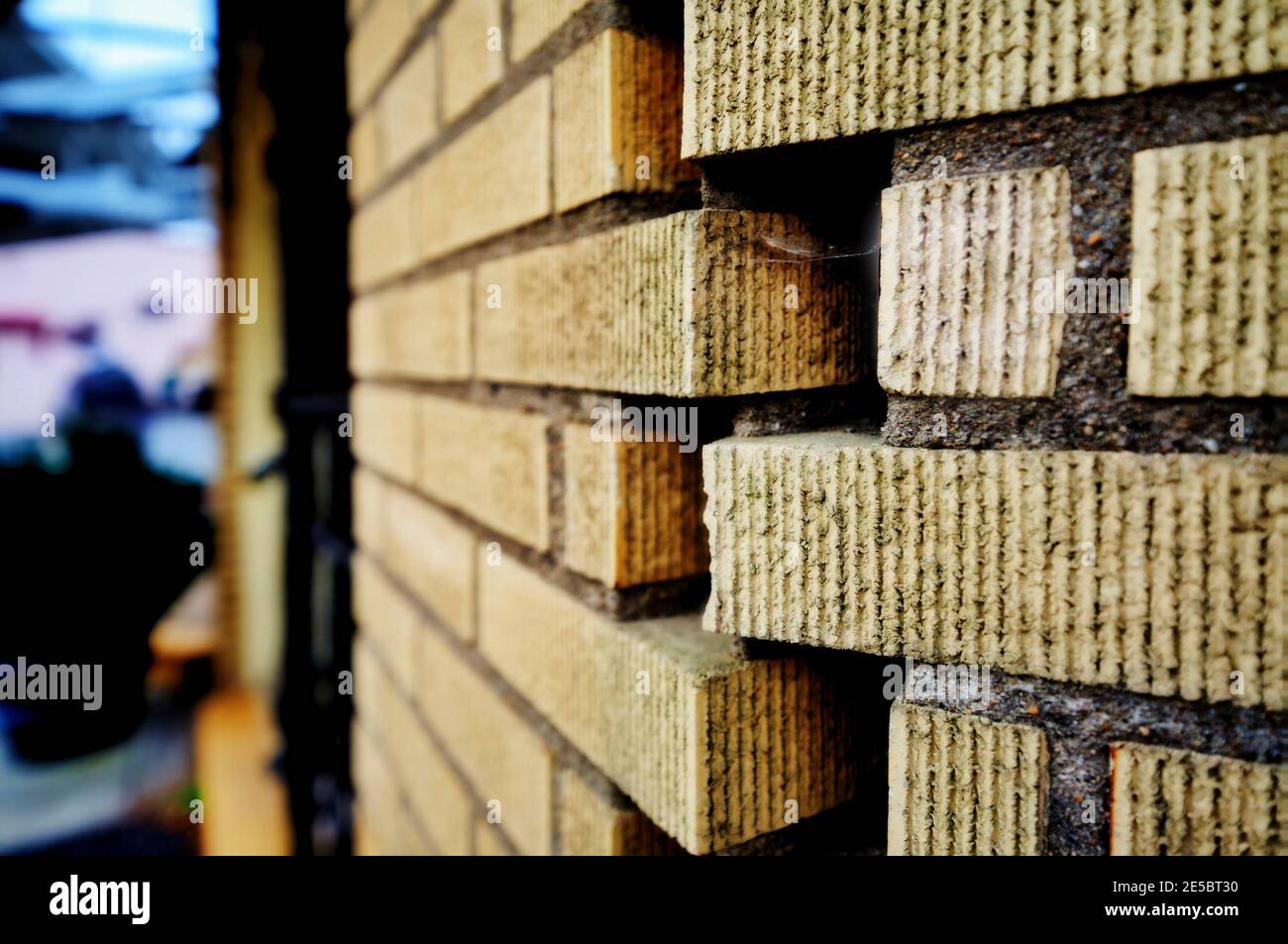 Brick wall bend around the corner Stock Photo - Alamy