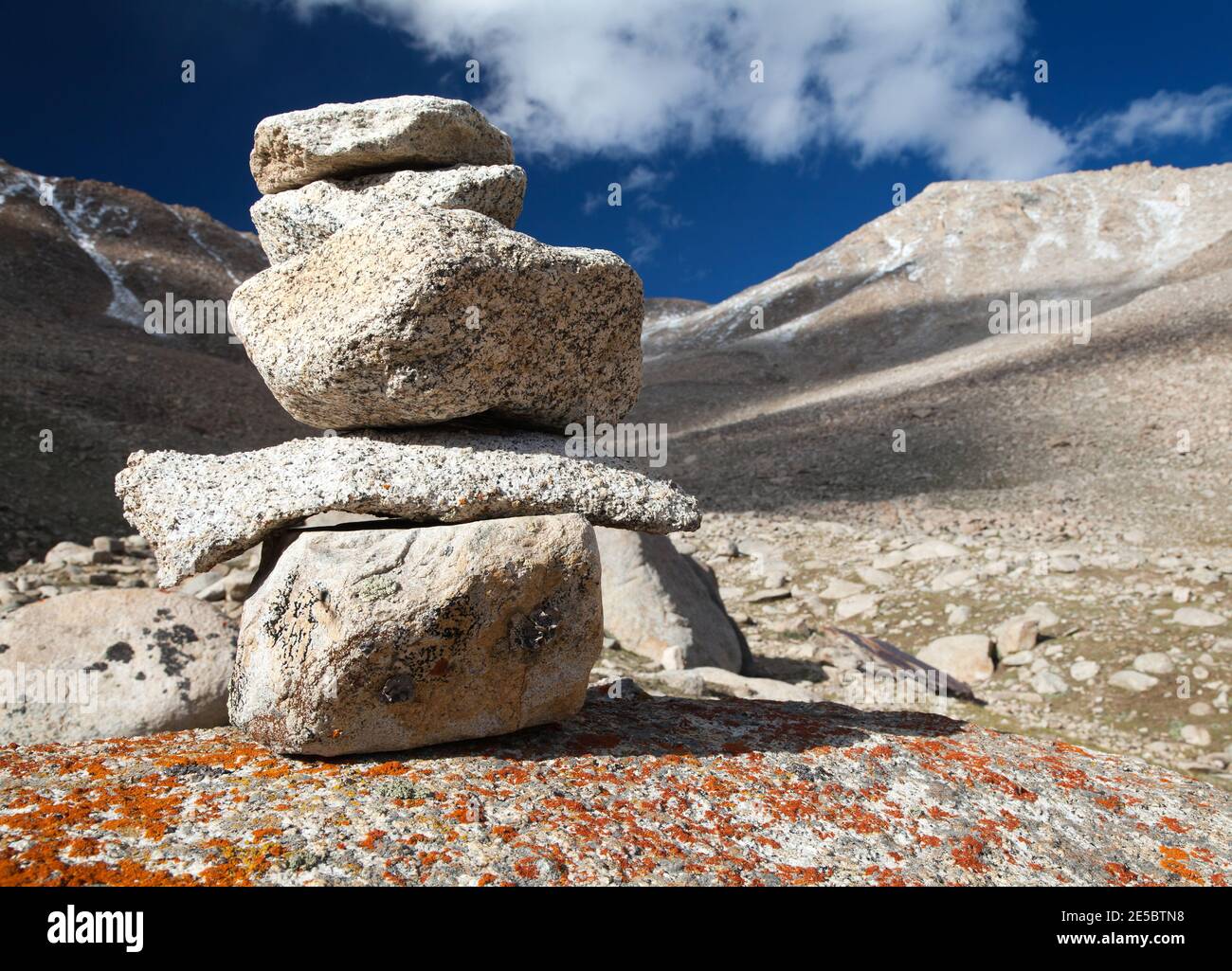 Stone man on mountains Stock Photo - Alamy
