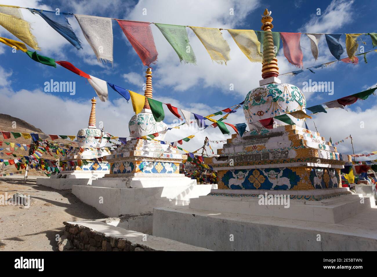 Prayer flags with stupas - Kunzum La pass - Himachal Pradesh - India ...