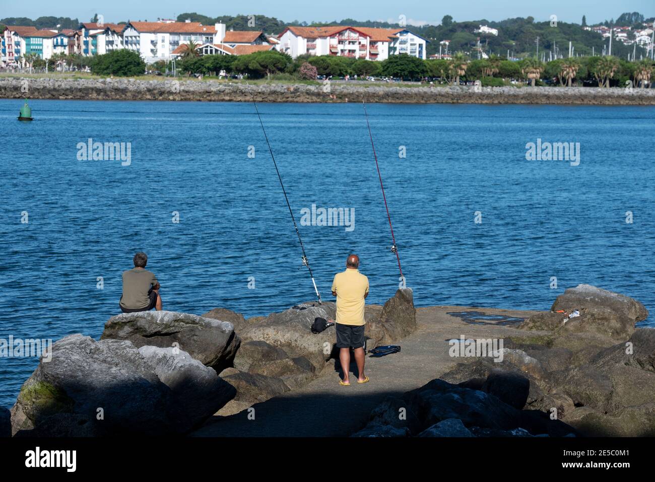 Two male fishermen hi-res stock photography and images - Alamy