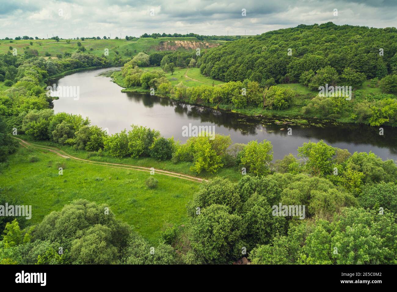 Green fields and trees with winding river hi-res stock photography and ...