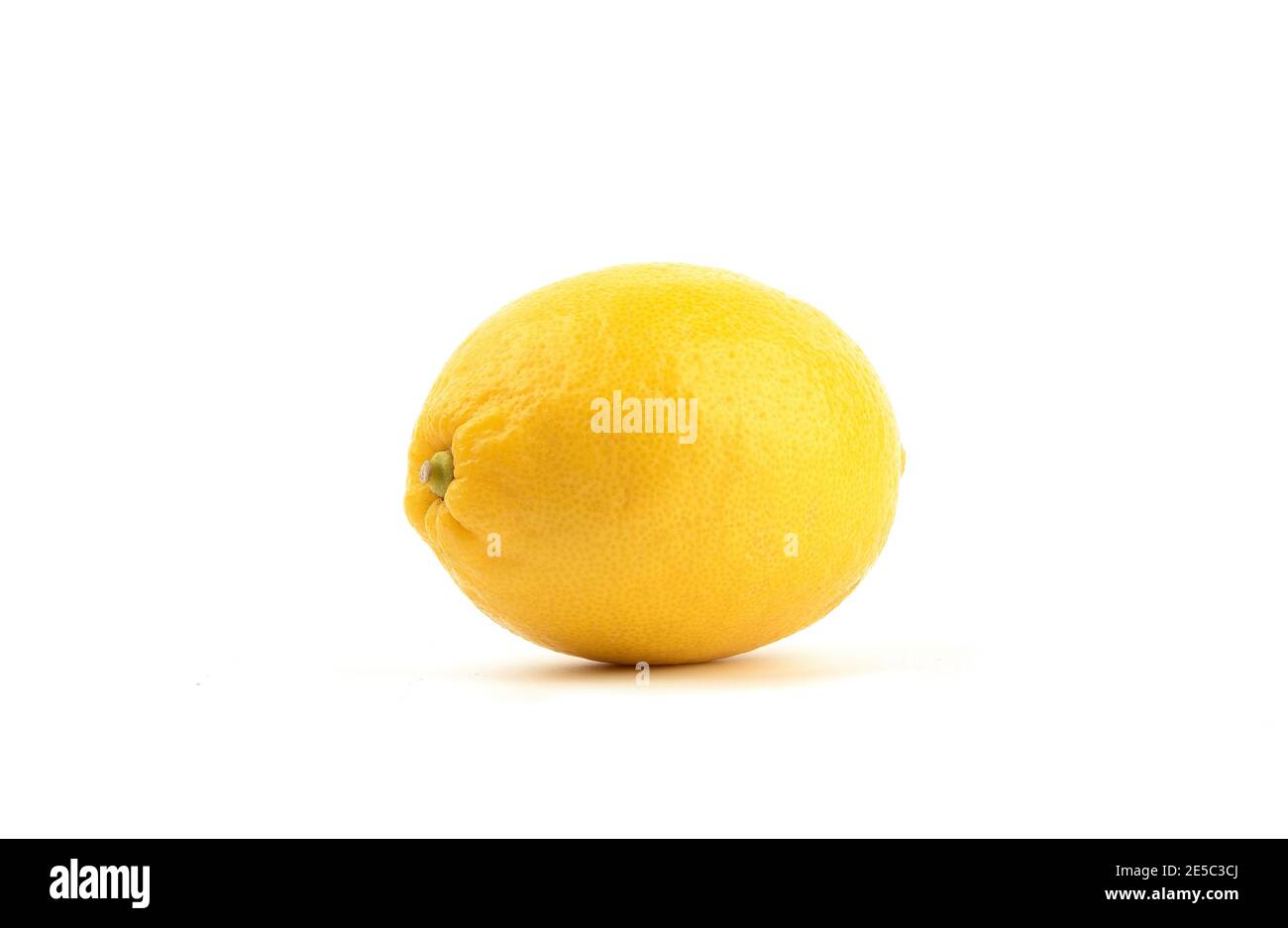 A whole lemon fruit over a white background. Close up. Copy space Stock ...