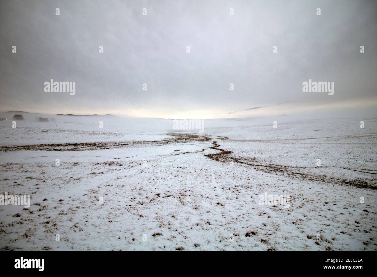 Winter, almost apocalyptic landscape of snow covering mountain fields ...
