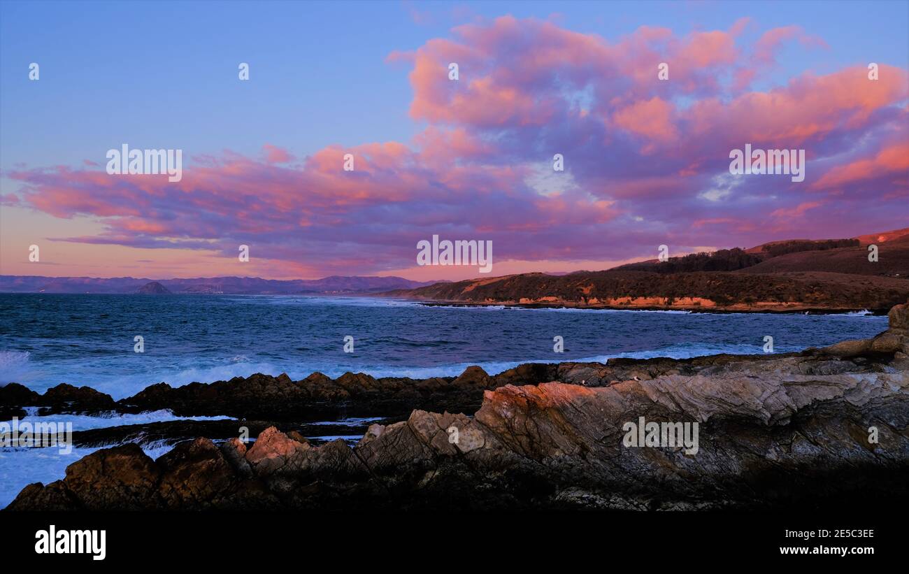 A beautiful California sunset on the coast. With pink and purple clouds ...