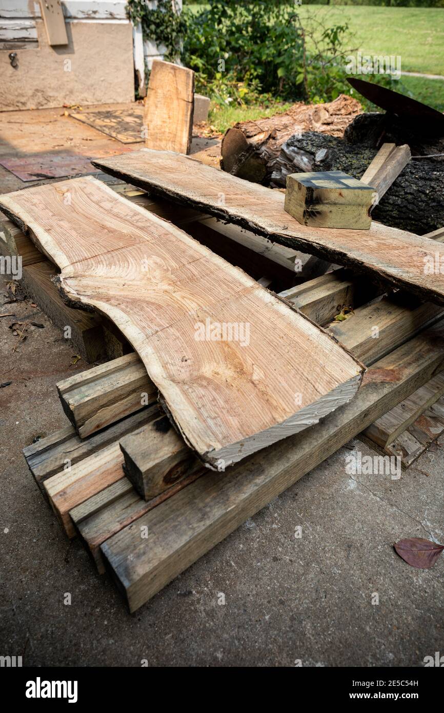 Home-milled black locust wood slabs Stock Photo - Alamy