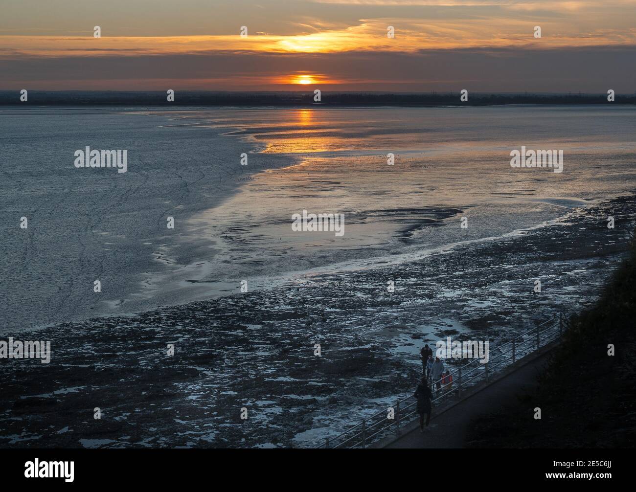 A break in heavy clouds allows for a beautiful sunset in Ramsgate, Kent ...