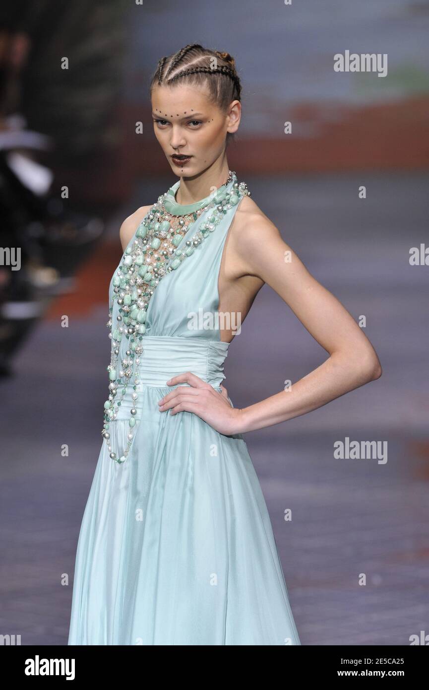A model presents a creation by designer Fabrizio Capriata as part of ...