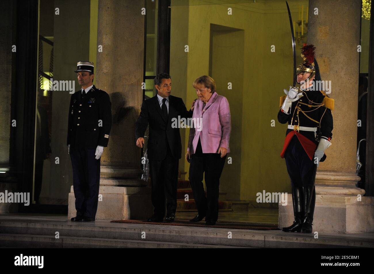 French President Nicolas Sarkozy and German Chancellor Angela Merkel at ...