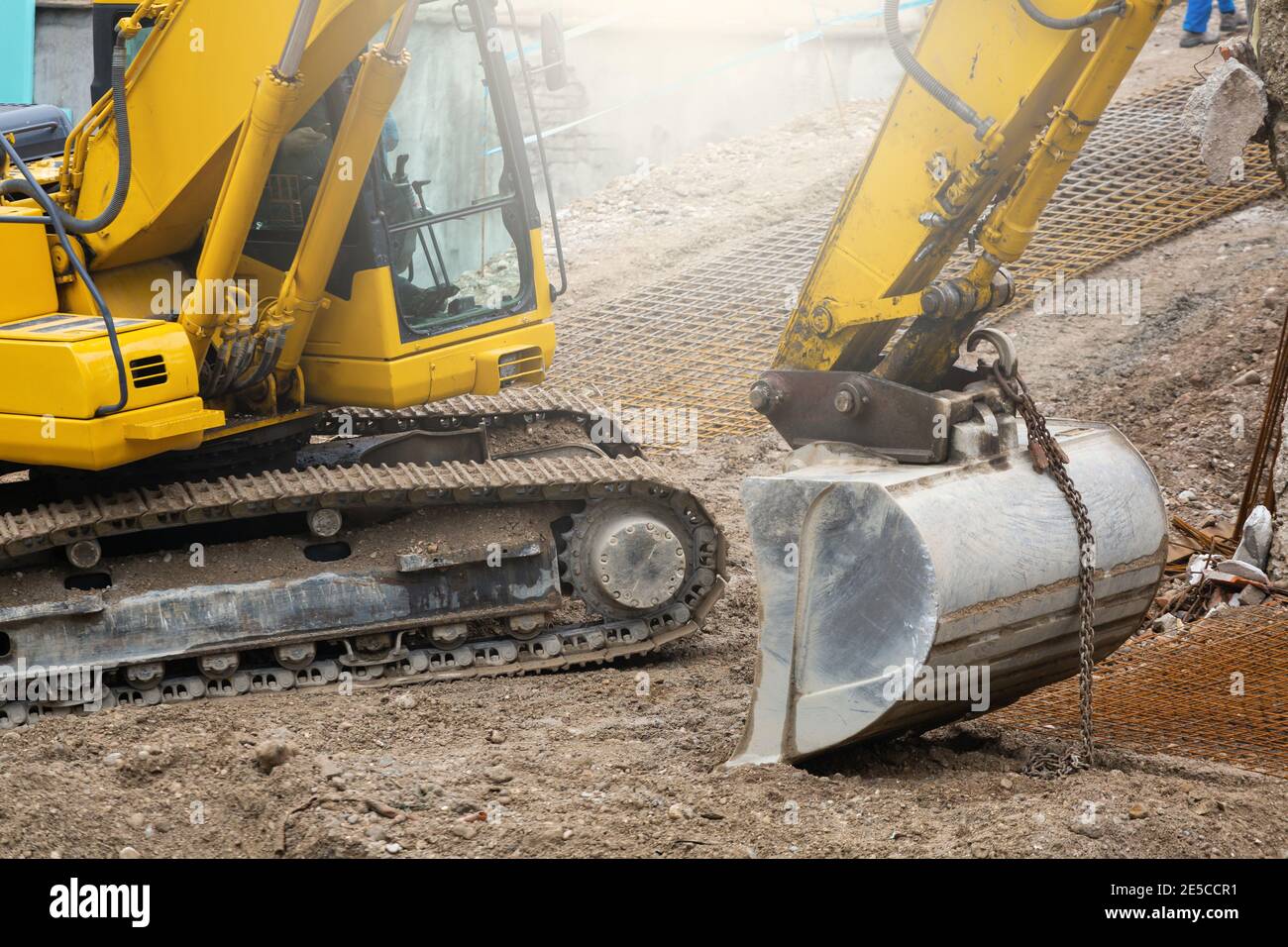 Excavator on construction site people hi-res stock photography and ...