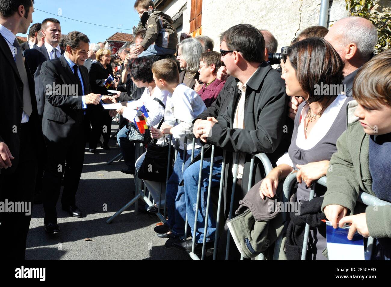 French President Nicolas Sarkozy and German Chancellor Angela Merkel ...