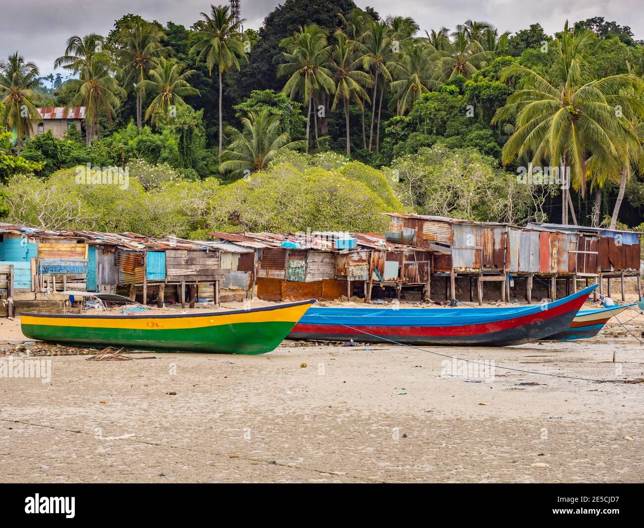Kaimana, Arguni Bay, Indonesia - February 2018: Colorful wooden boats ...