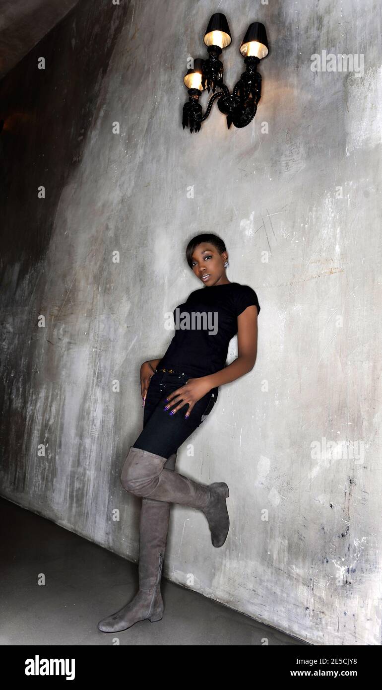 EXCLUSIVE. British singer Estelle poses inside Baccarat showroom in ...