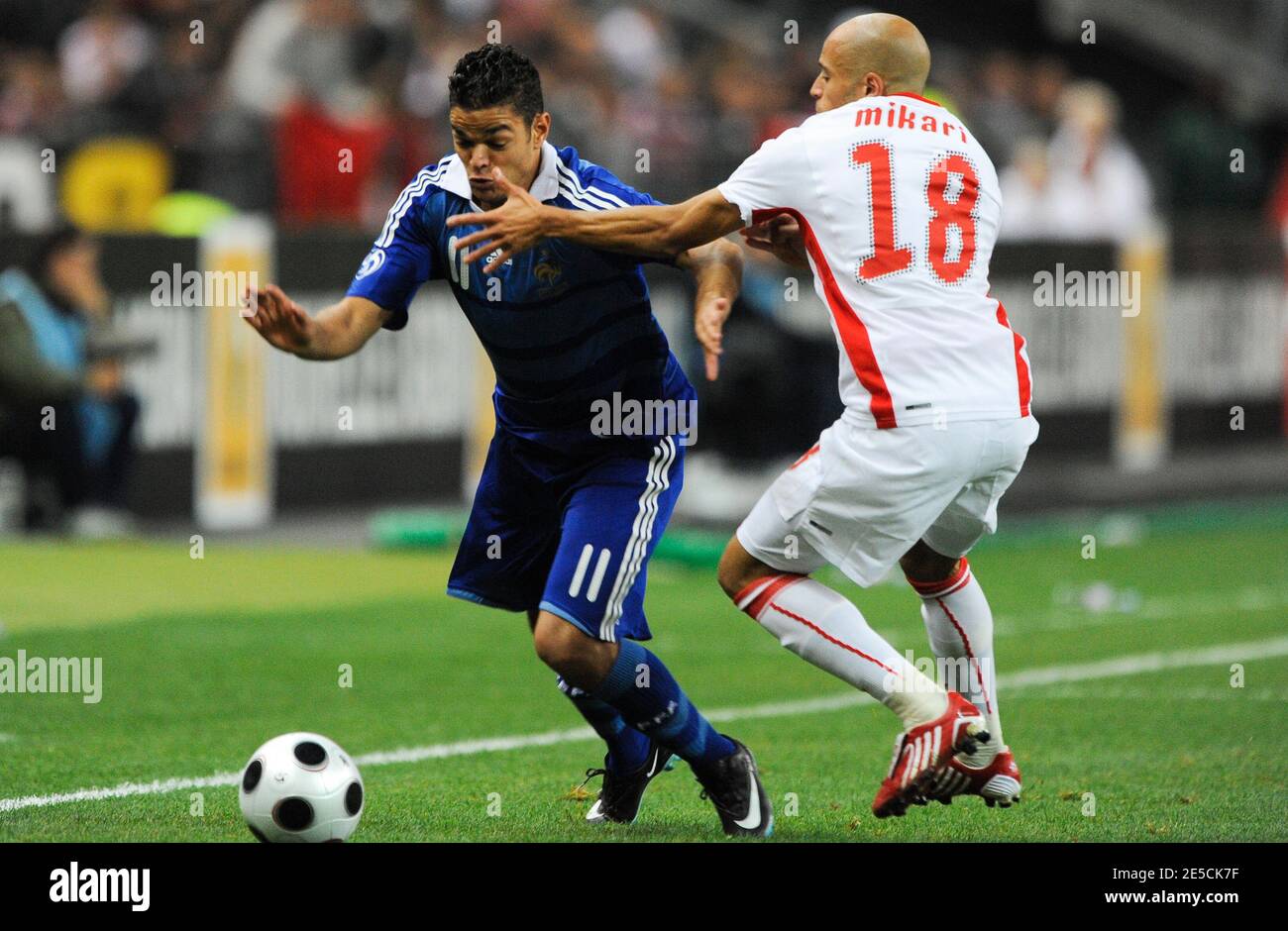 France's Hatem Ben Arfa battles Tunisia's Mikari during the ...