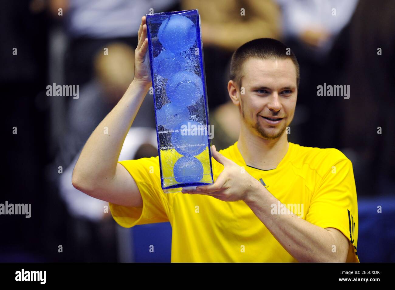 Sweden's Robin Soderling holds his trophy after the Final round of the ...