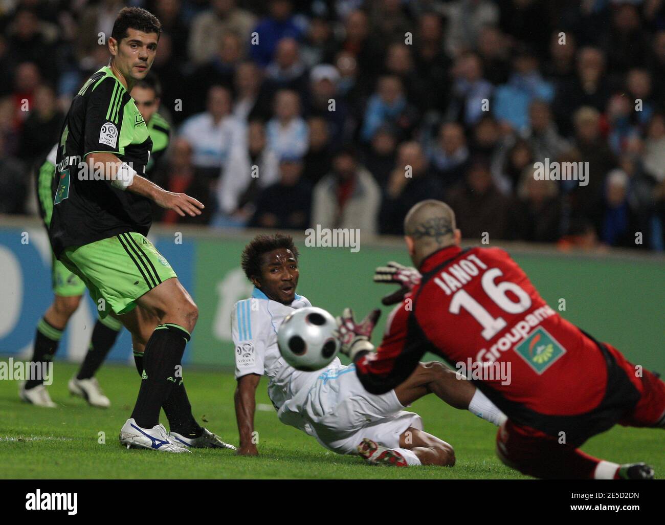 Marseille's Baky Kone and Saint Etienne's tatooed goalkeeper Jeremie ...