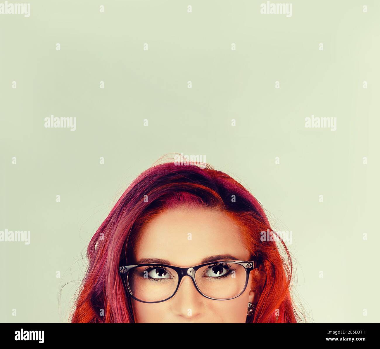 Closeup portrait headshot thoughtful cute woman face above nose looking ...