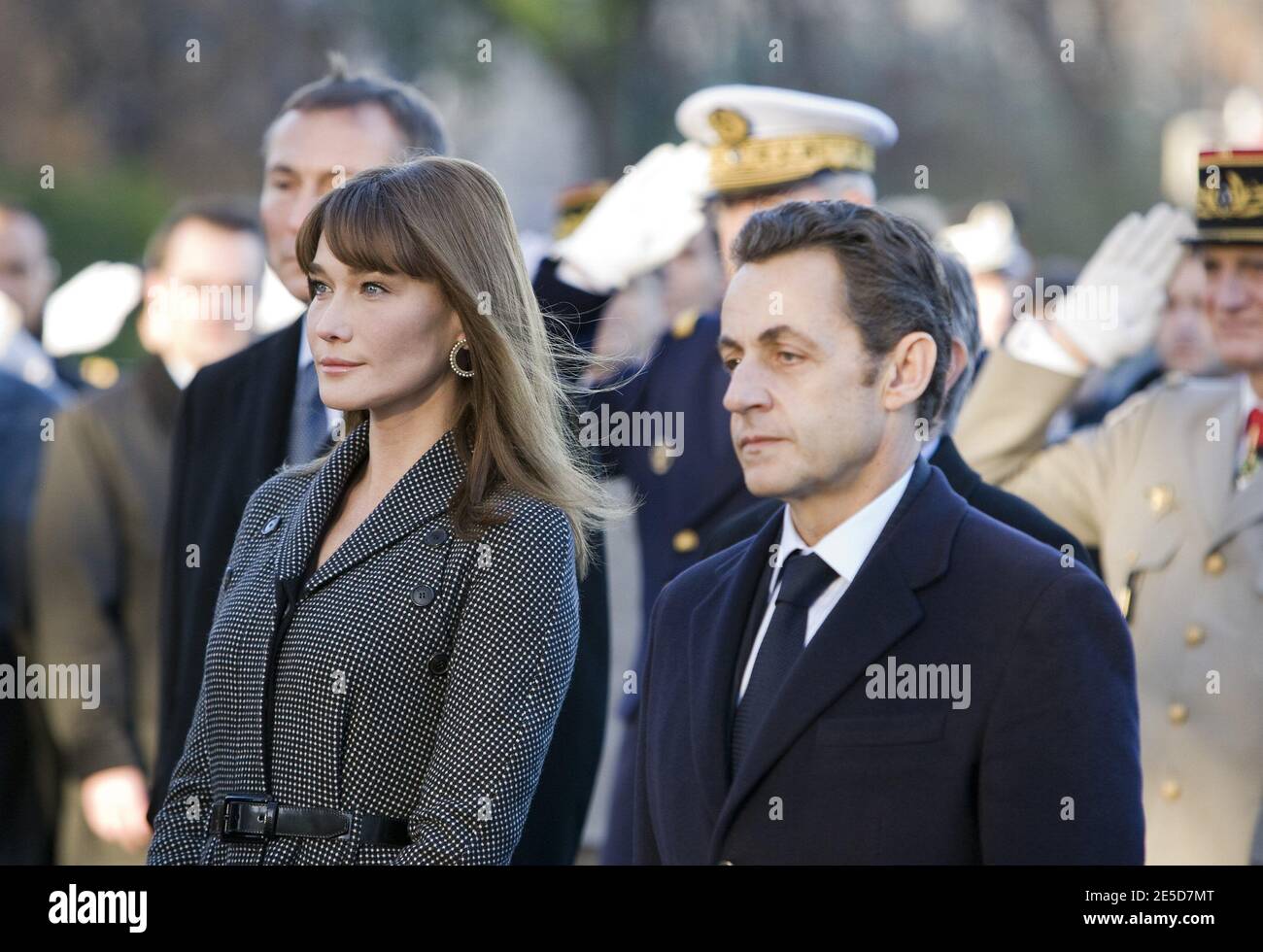 President Nicolas Sarkozy and his wife Carla Bruni-Sarkozy take part in ...