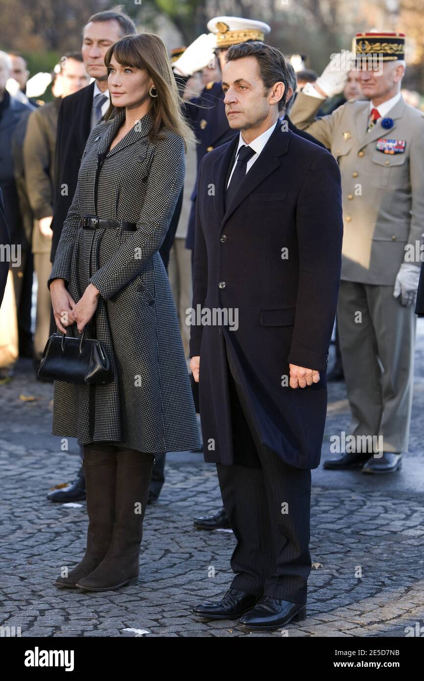 President Nicolas Sarkozy and his wife Carla Bruni-Sarkozy take part in ...