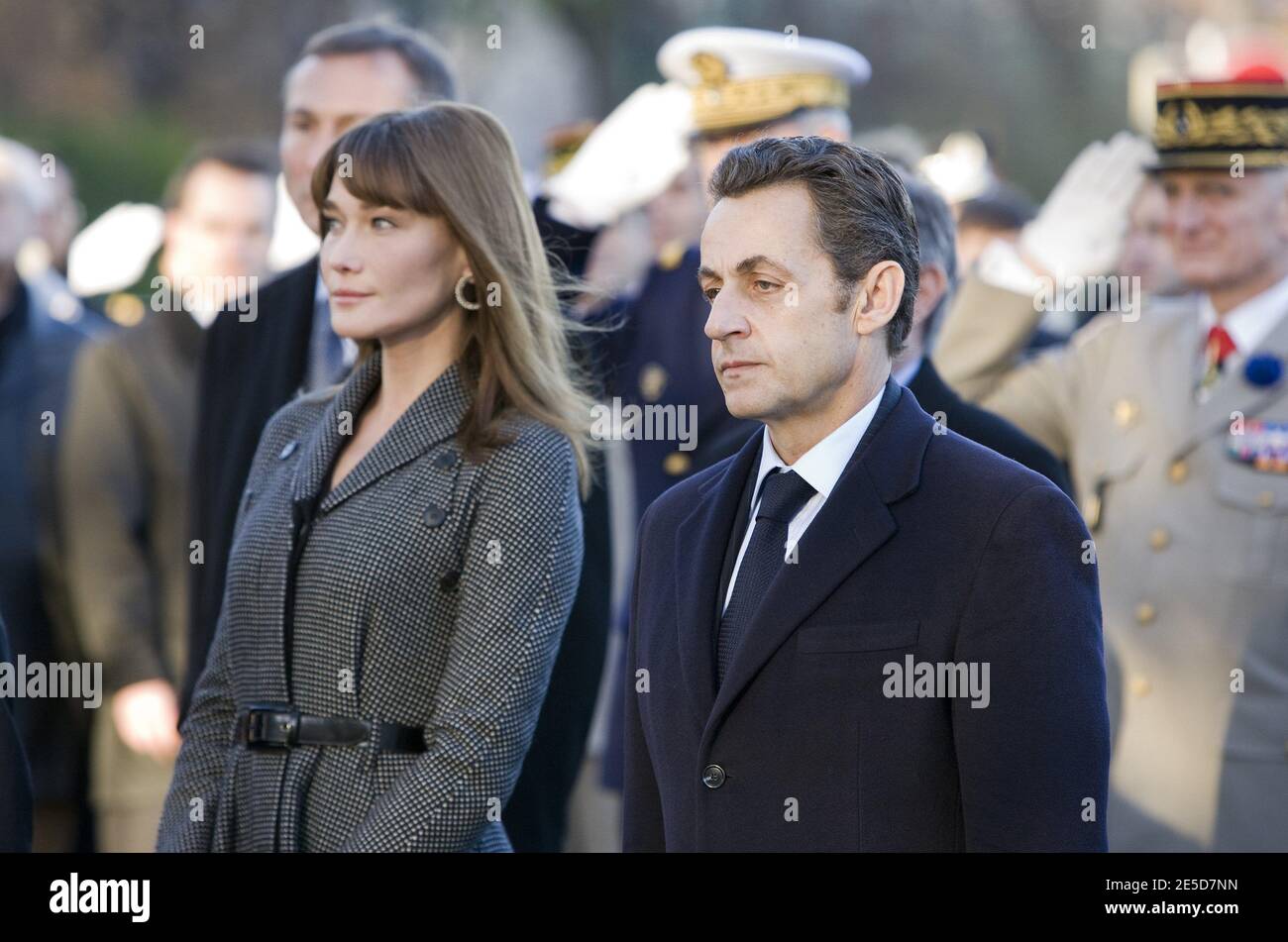 President Nicolas Sarkozy and his wife Carla Bruni-Sarkozy take part in ...