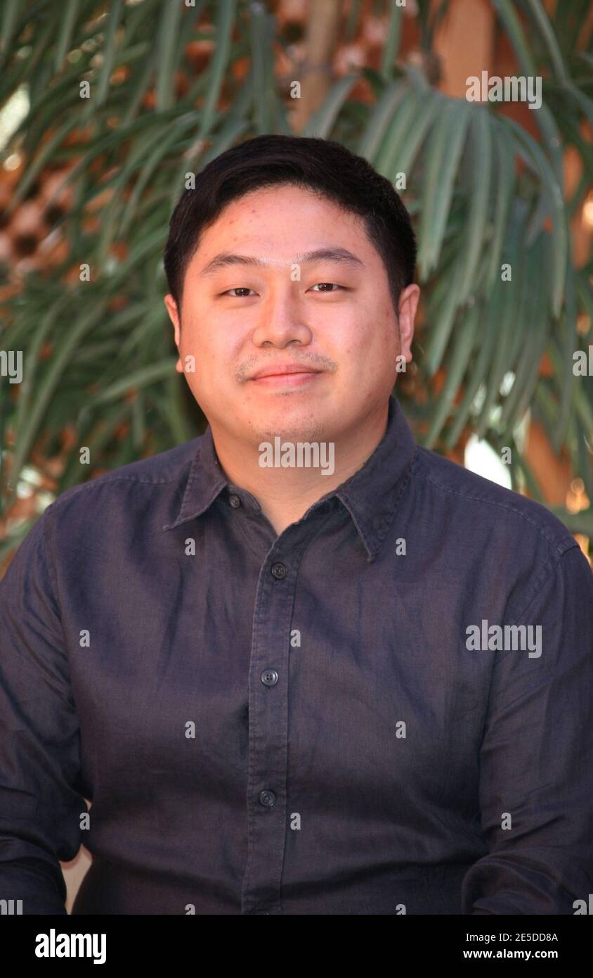 Director Zhang Chi poses at the photocall of 'The Shaft' during the 8th ...