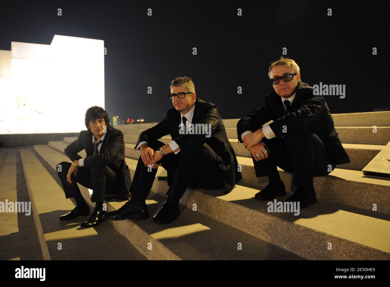 (L-R) Rolling Stones guitarist Ron Wood, gallery owner Jay Joplin and ...