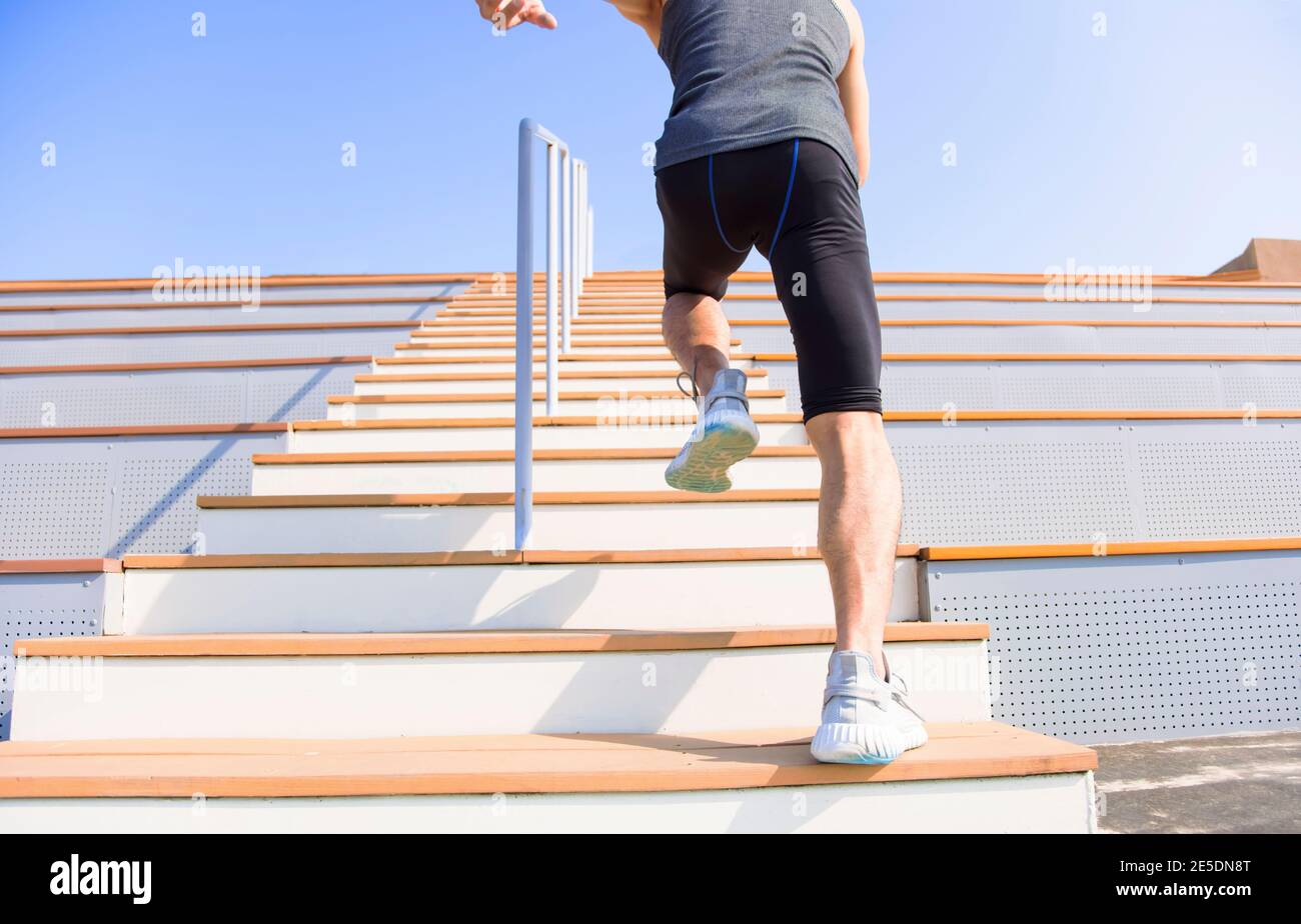 Young asian man running up hi-res stock photography and images - Alamy