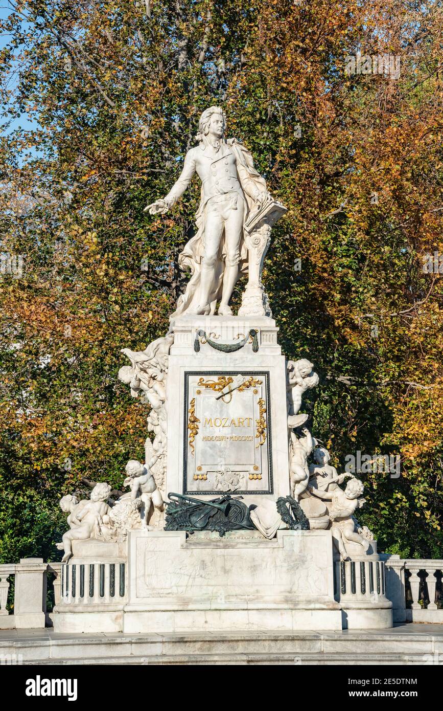 Warm sunset over Mozart monument in front of Palmenhaus, near Neue Burg ...