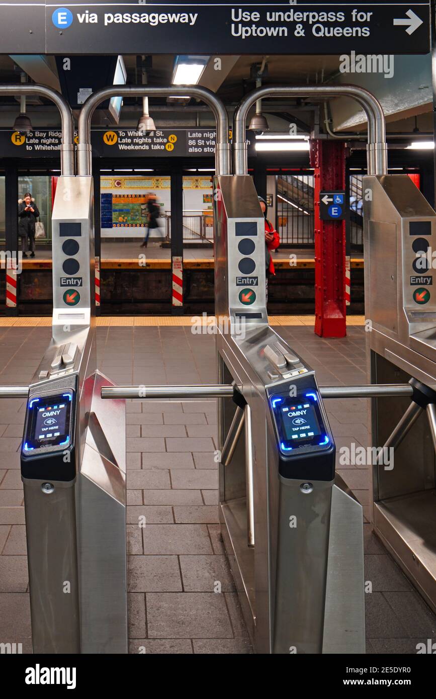 NEW YORK CITY, NY -31 JAN 2020- View of turnstiles at the entrance of a ...