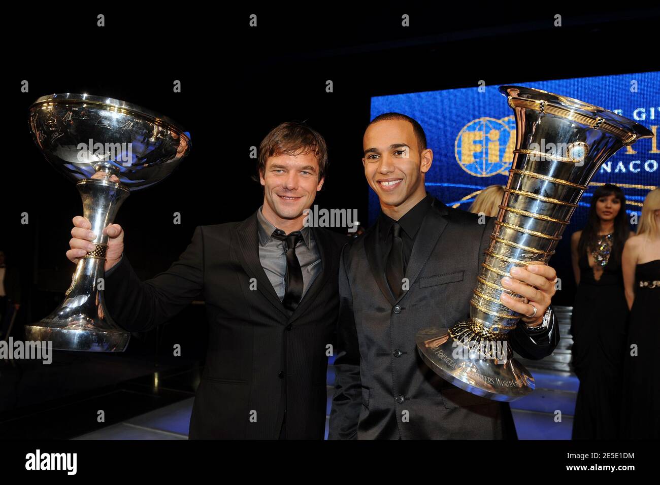 Formula one driver Lewis Hamilton with Rally driver Sebastien Loeb ...