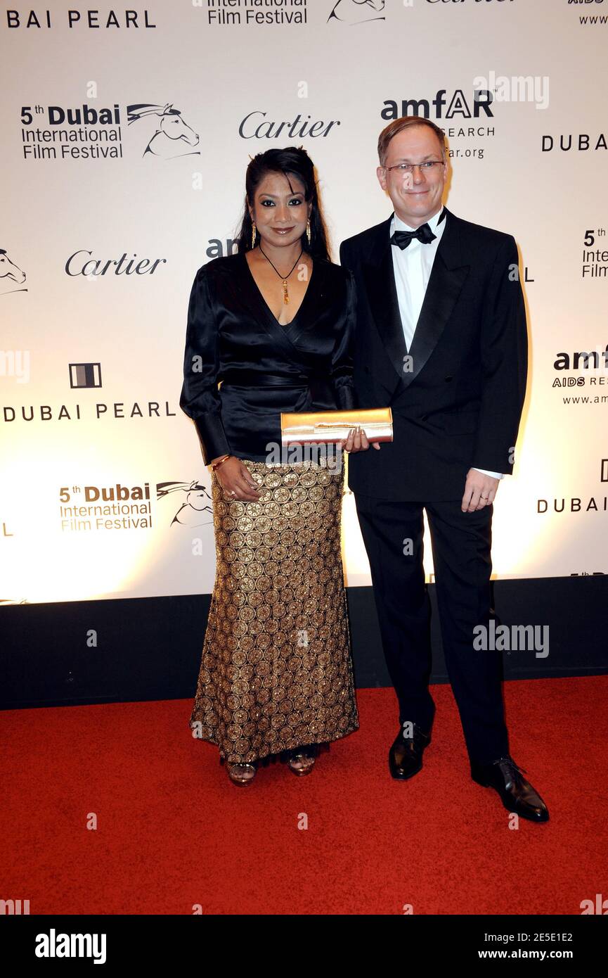 'Cartier' executive Patrick Normand and wife seen arriving at a 'Cinema ...