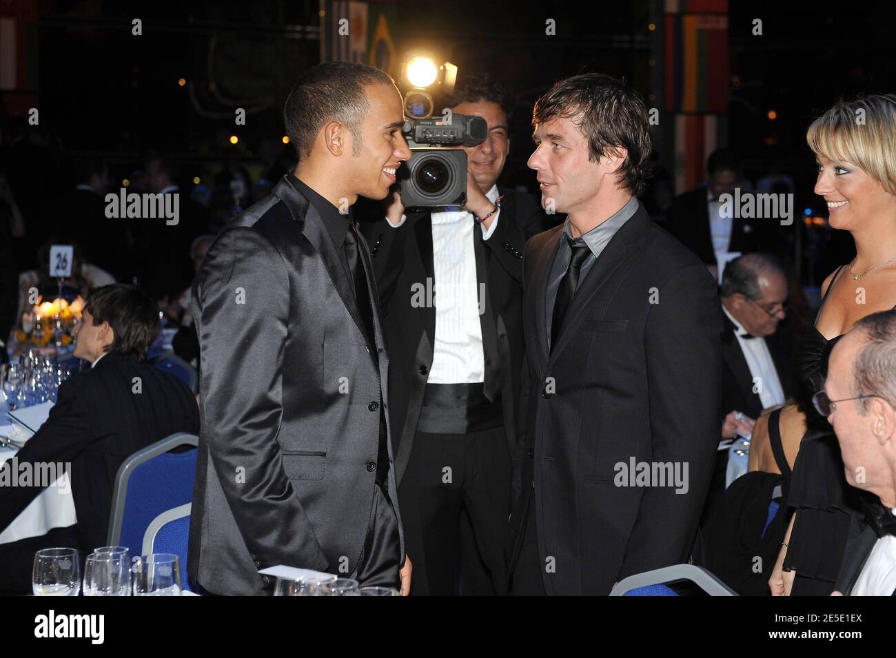 Formula one driver Lewis Hamilton with Rally driver Sebastien Loeb ...